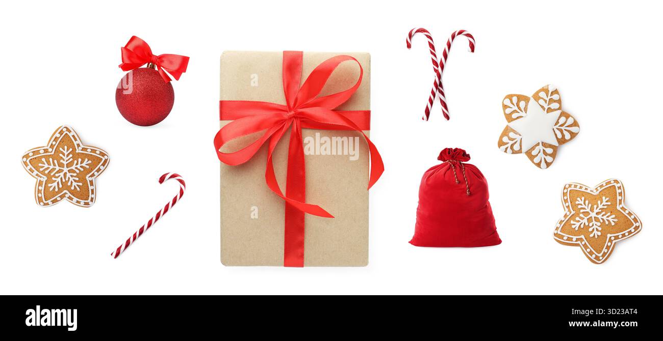 Christmas candy canes, cookies, red bag, gift box and festive ball ...
