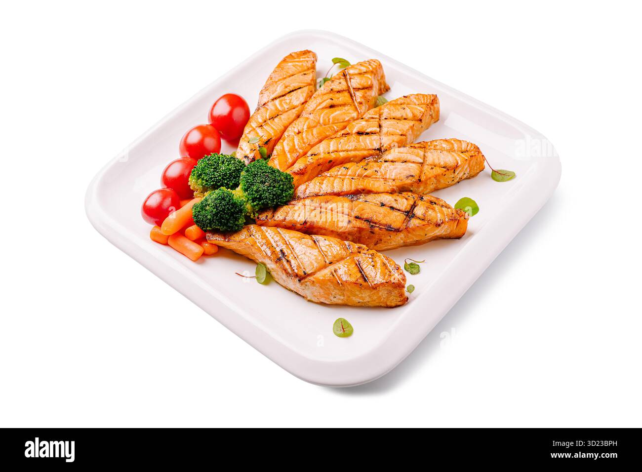 Juicy grilled salmon fillets are plated alongside colorful cherry ...