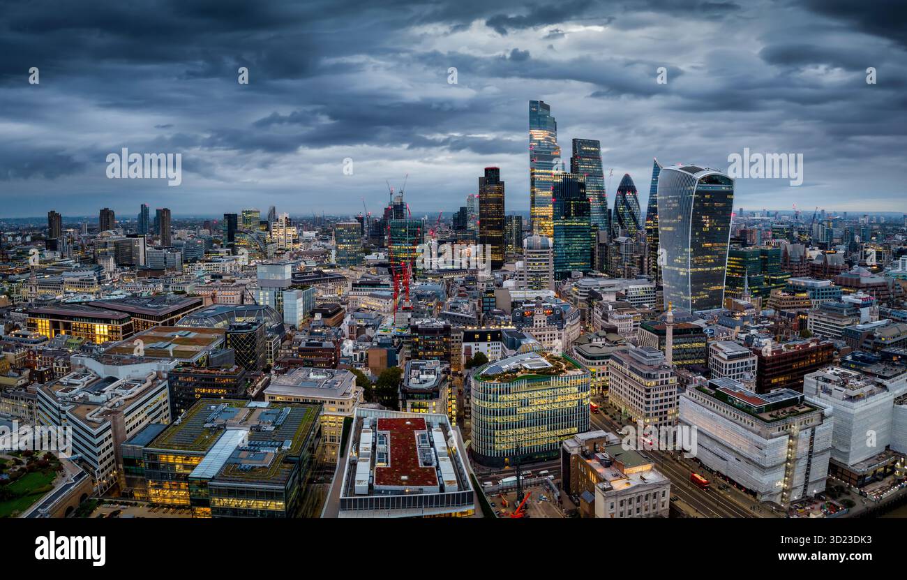 Panoramic aerial view of the illuminated skyline of the City of London ...