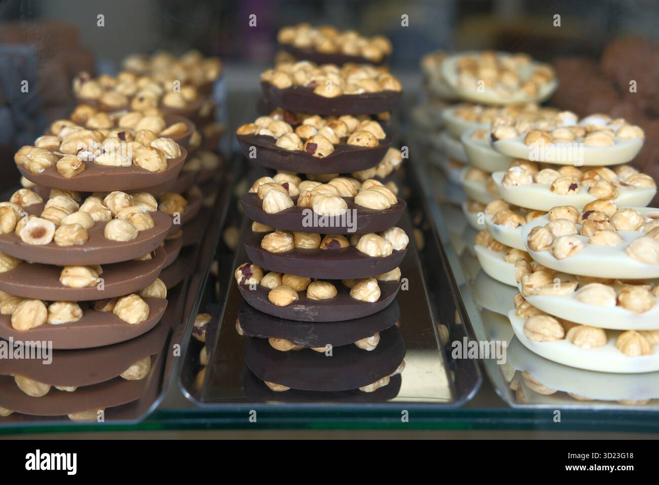 Cookies with hazelnuts covered in milk, dark or white chocolate ...