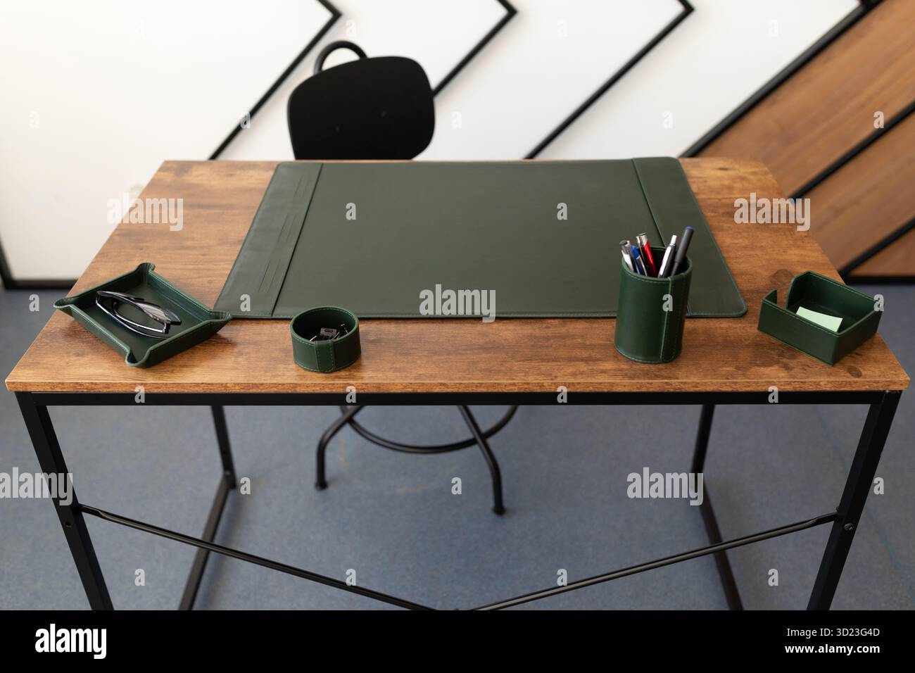 Workplace in the office with a boulevard and stands for stationery top ...