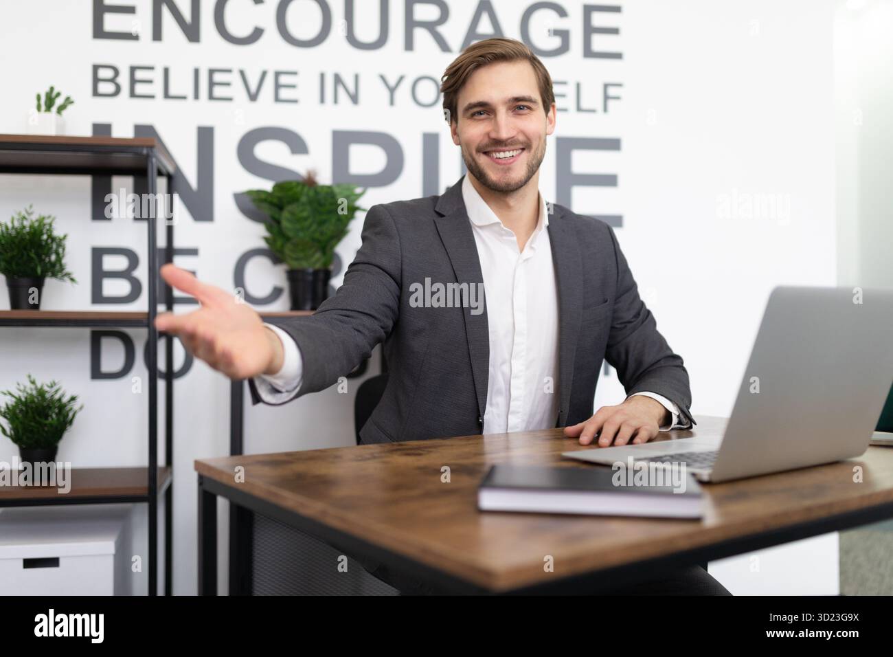 Manager welcomes new employee hi-res stock photography and images - Alamy