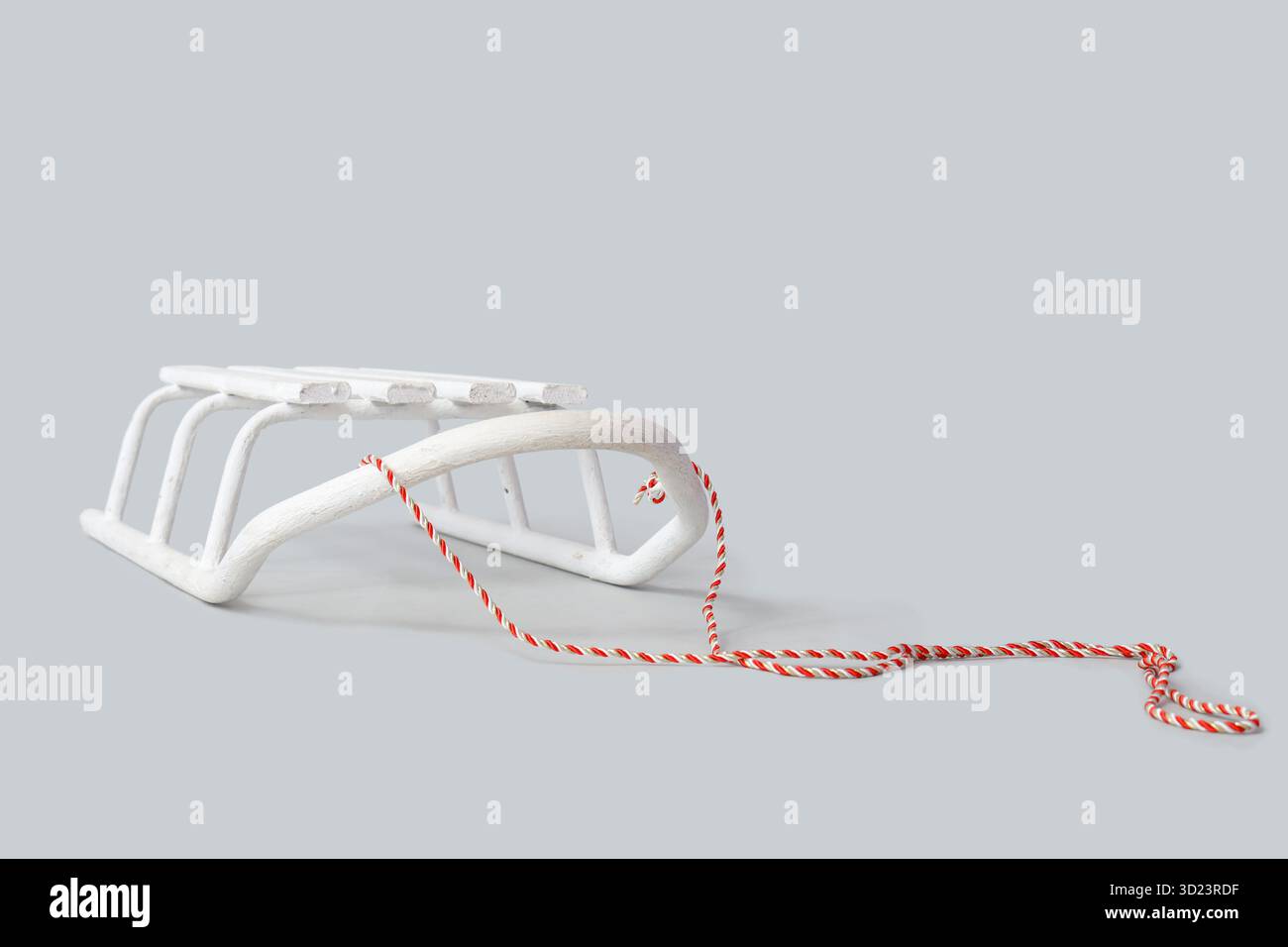 White empty sled on white background Stock Photo - Alamy