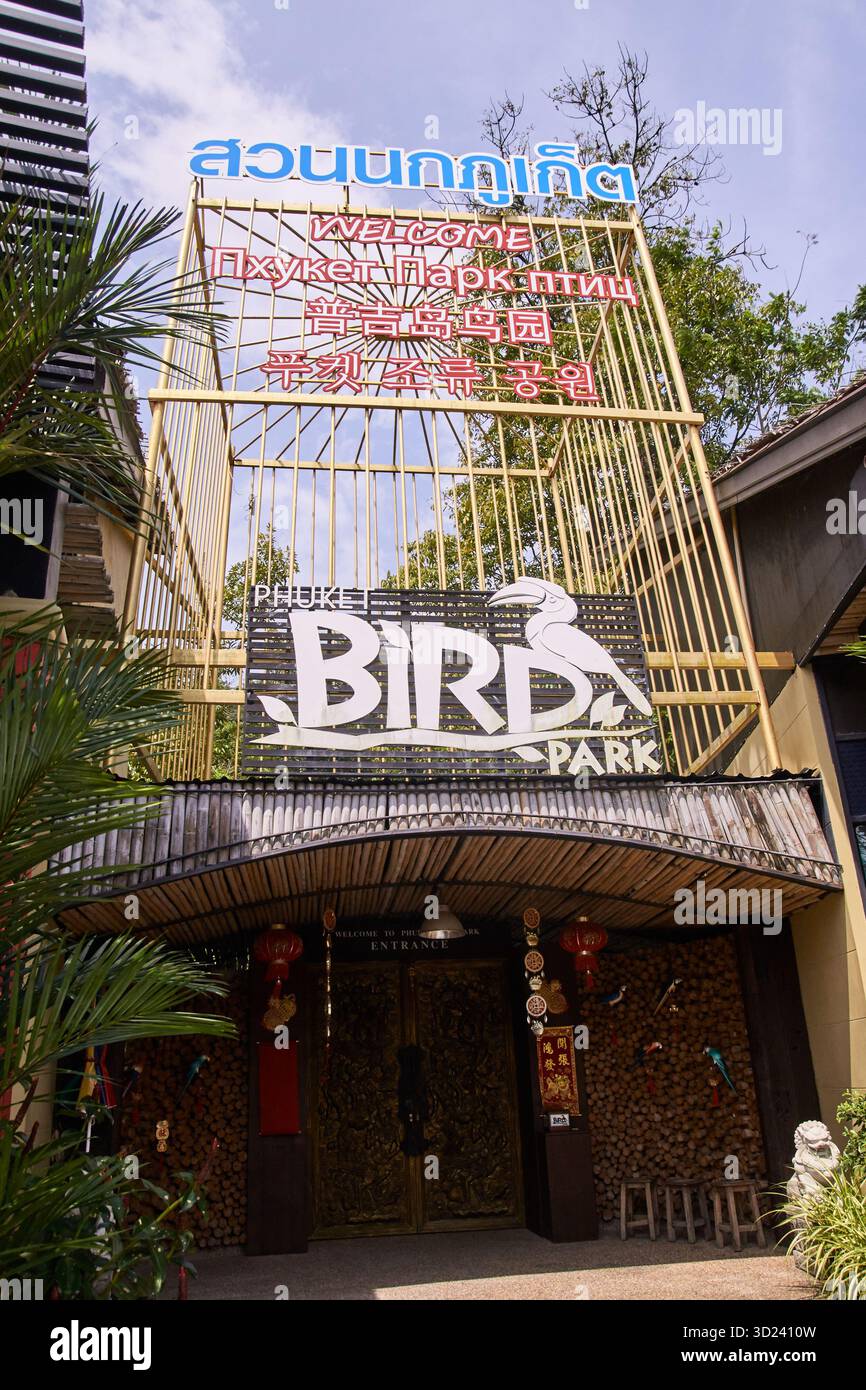 Entrance of phuket bird park with multilingual signage and tropical ...