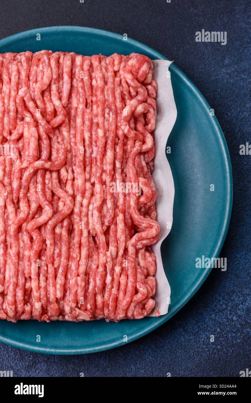 Raw ground beef or pork, prepared meat for burgers or other food ...