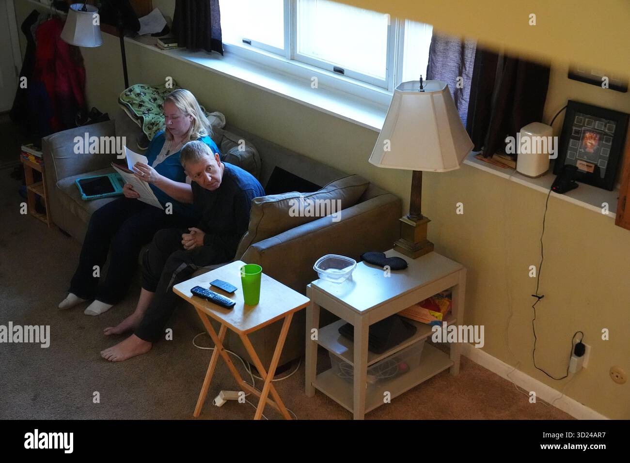Bill Swick, right, looks around while study with his wife Martha Swick ...