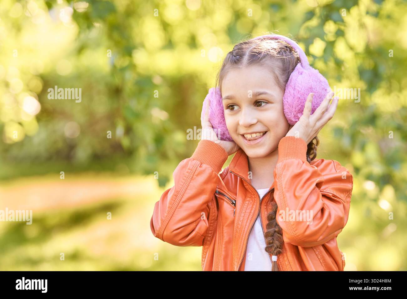 Orange jacket ear muffs hi-res stock photography and images - Alamy