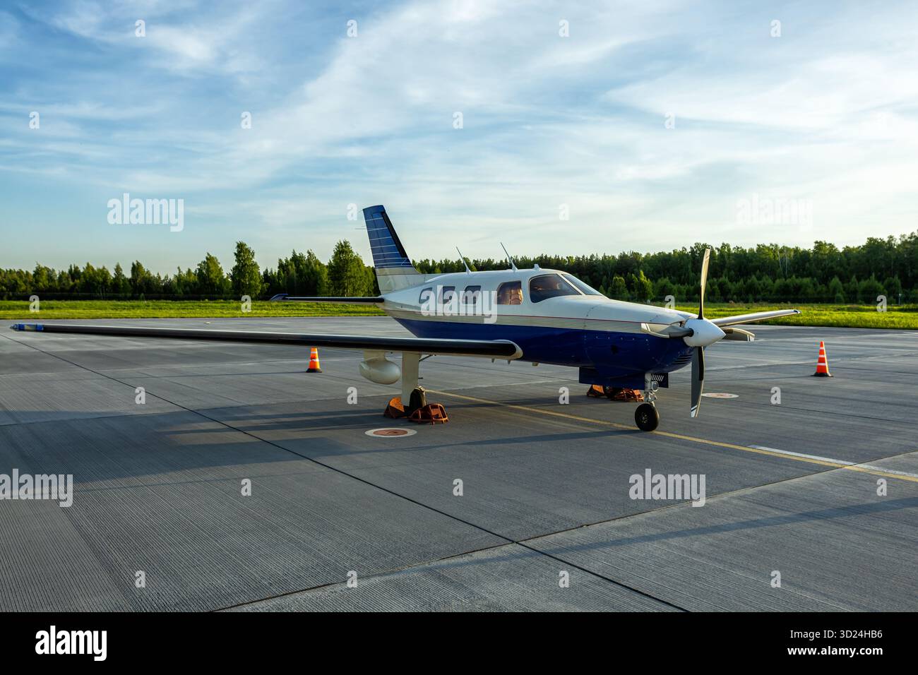 Private turboprop airplane at the airport in the morning Stock Photo ...