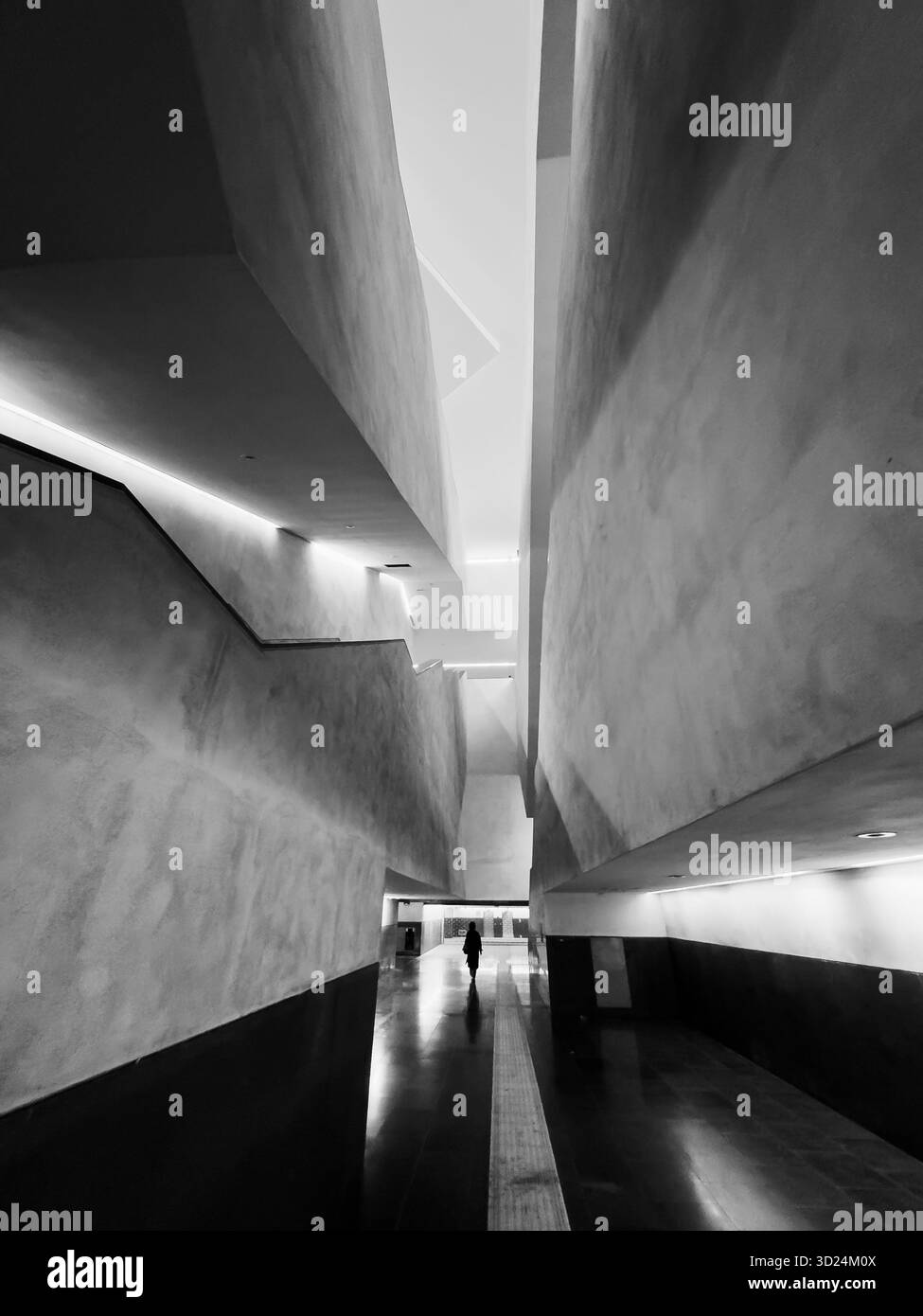 Monochrome corridor interior with angled walls and soft lighting ...