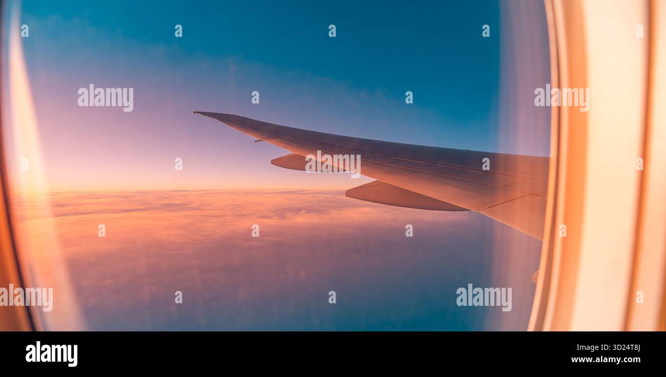 Airplane wings in sunset hi-res stock photography and images - Alamy