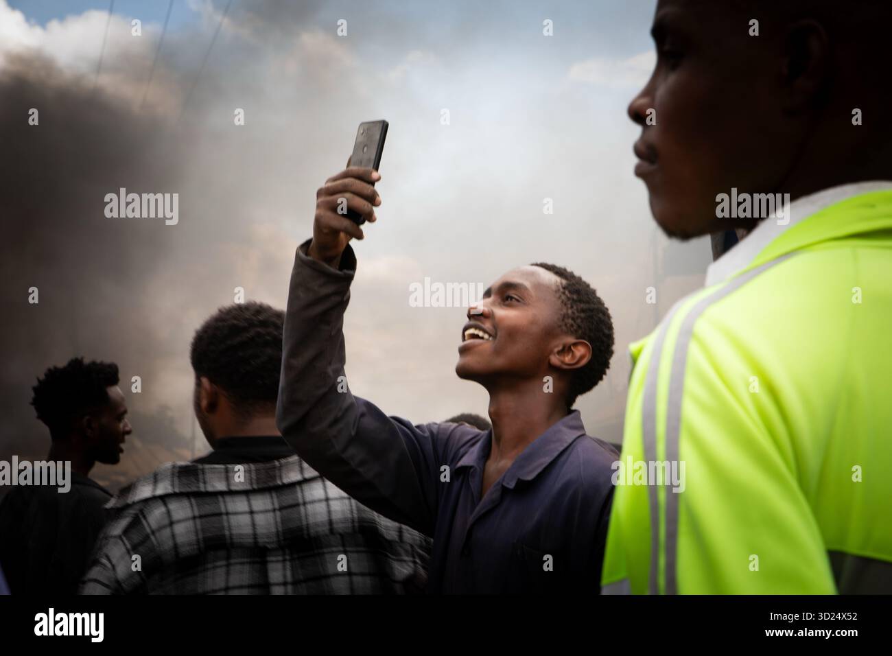 People protest in the streets of Arusha, Tanzania, on election day ...