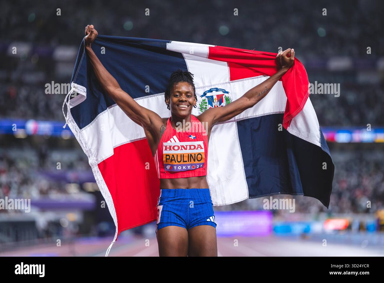 Marileidy Paulino celebrating her victory with her country's flag at ...
