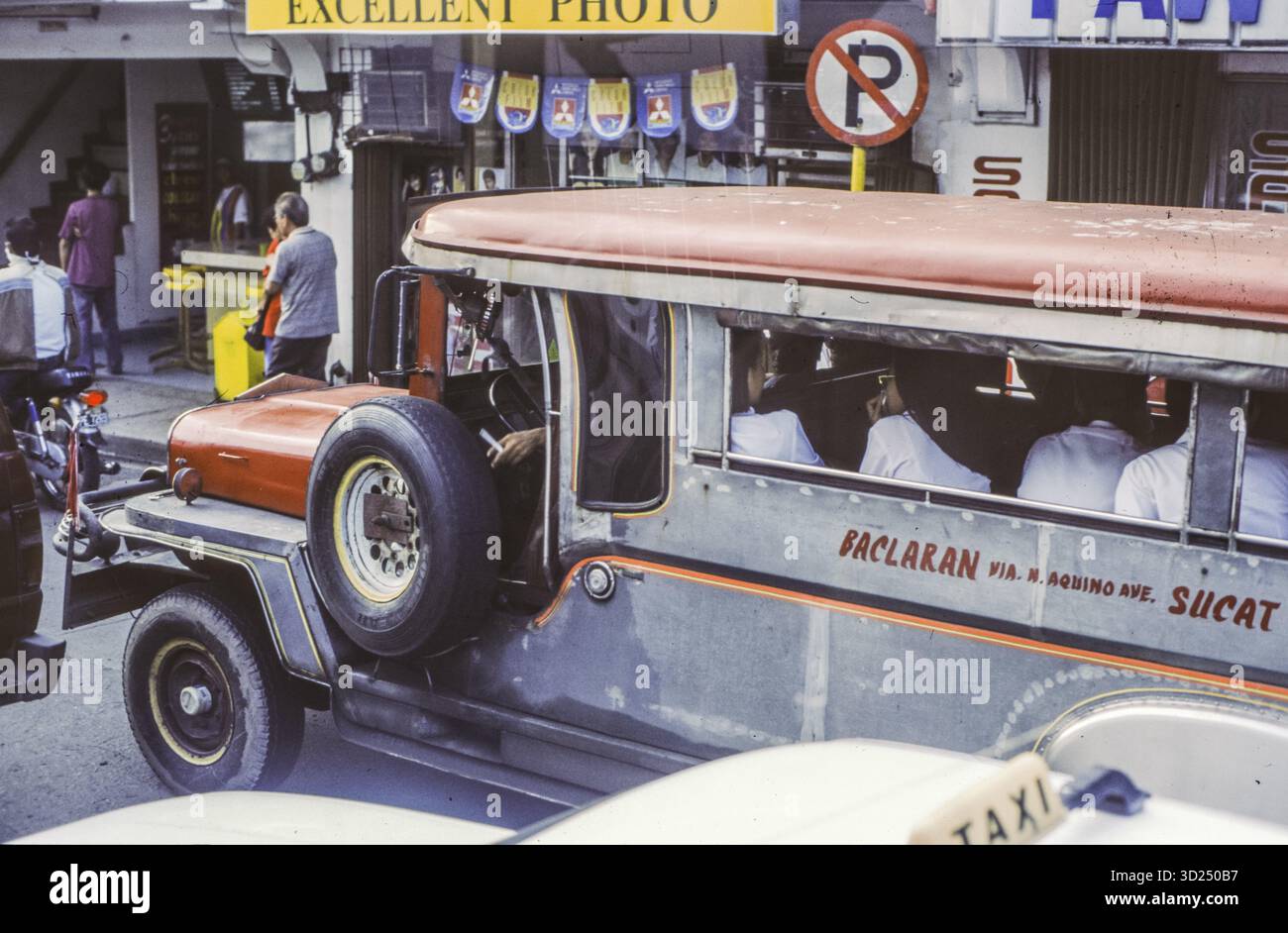 Jeepney, minibus in heavy traffic with nuns as passengers, Manila in ...