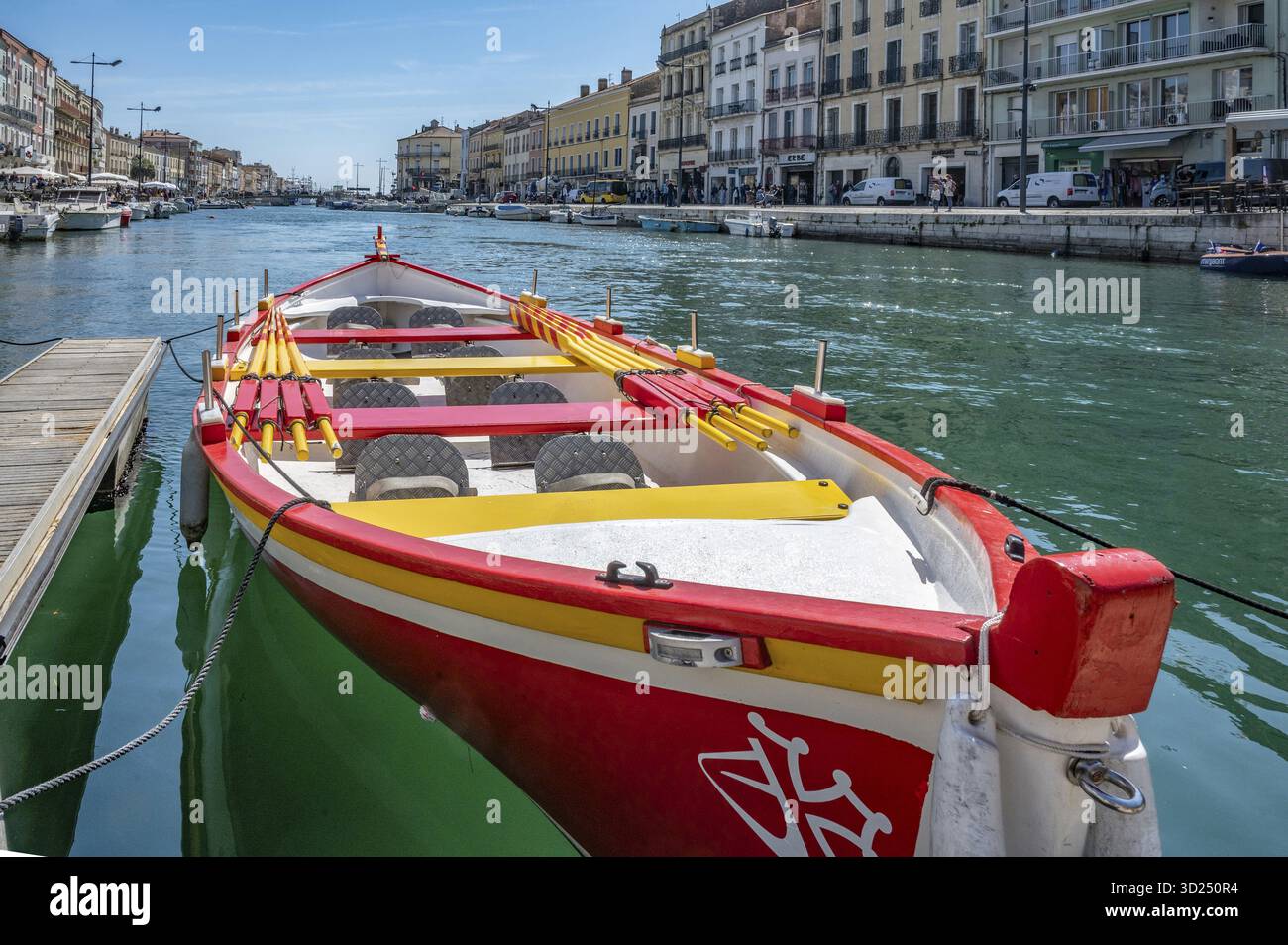 Close-up of a traditional, colorful wooden boat with the cross and the ...