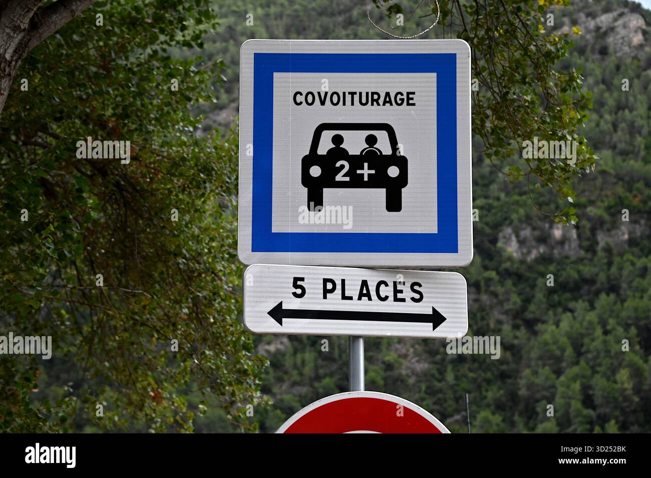 Signs indicating parking spaces reserved for people practicing ...