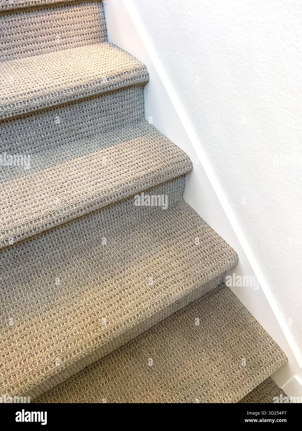 Close-Up Carpeted Stair with White Trim Stock Photo - Alamy