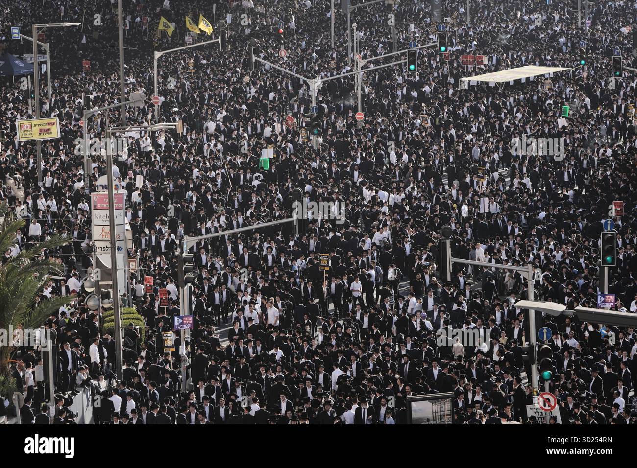 Ultra-Orthodox Jewish men attend a rally against plans to force them to ...