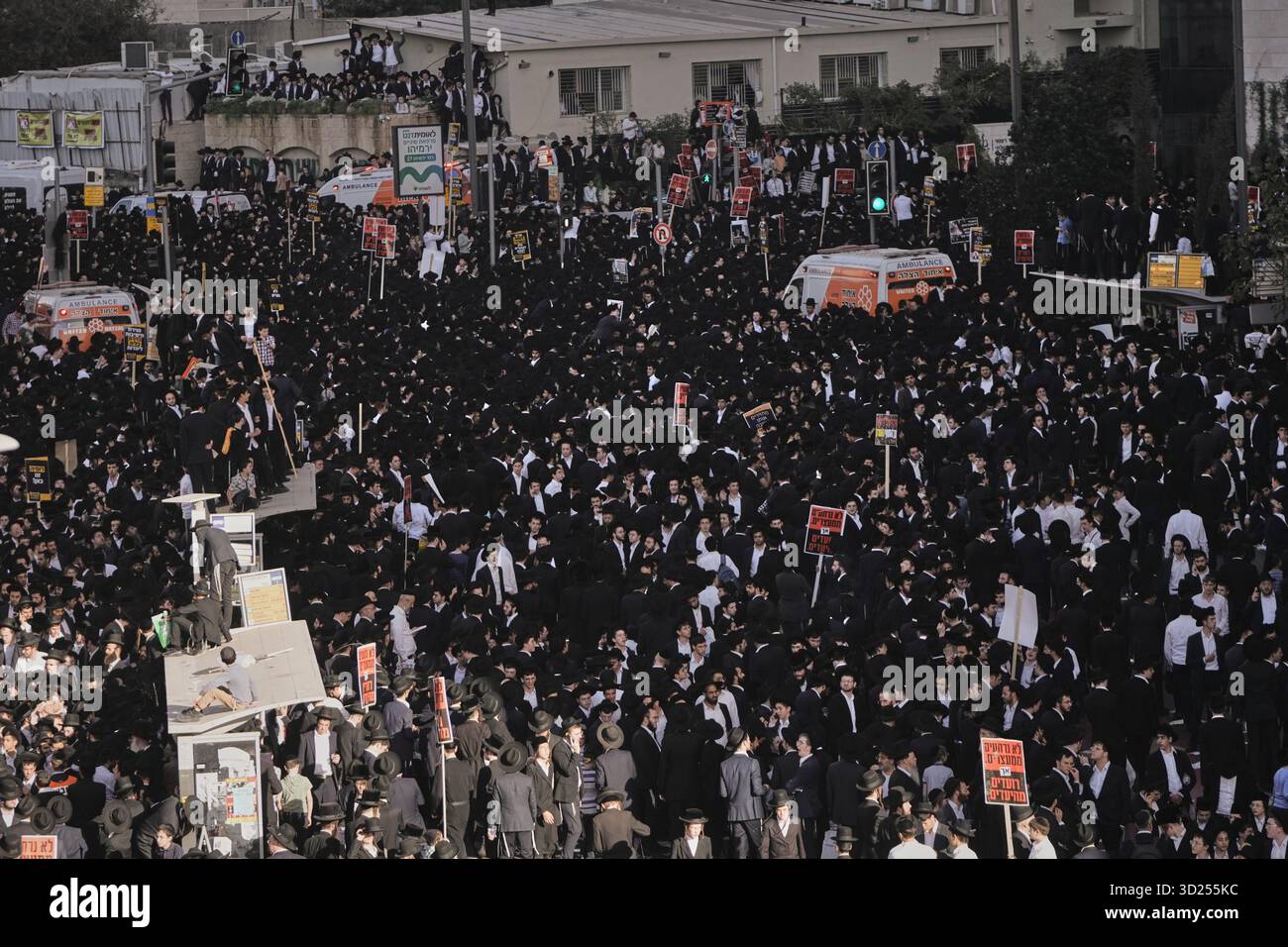 Ultra-Orthodox Jewish men attend a rally against plans to force them to ...
