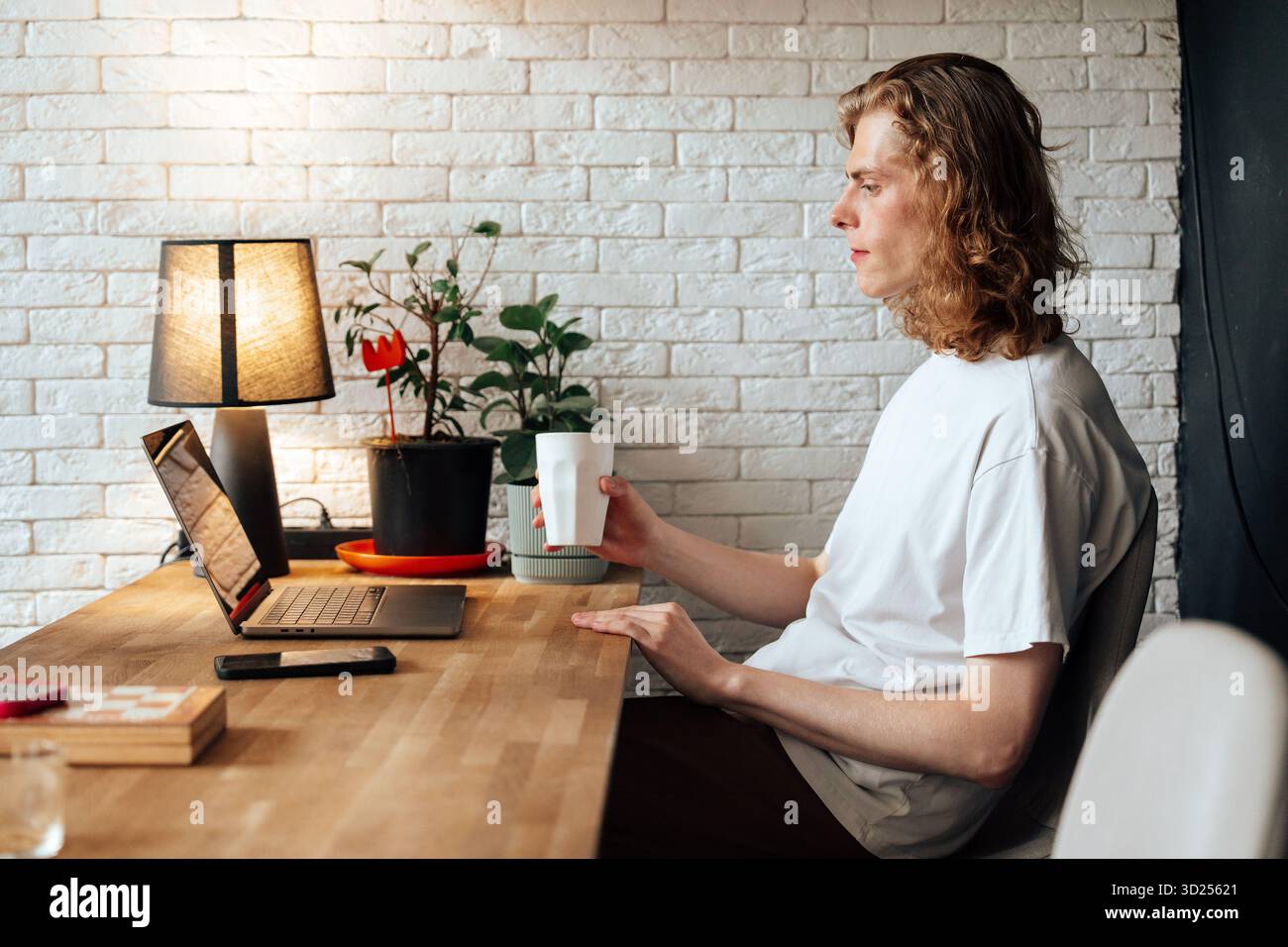 Working quietly in well hi-res stock photography and images - Alamy