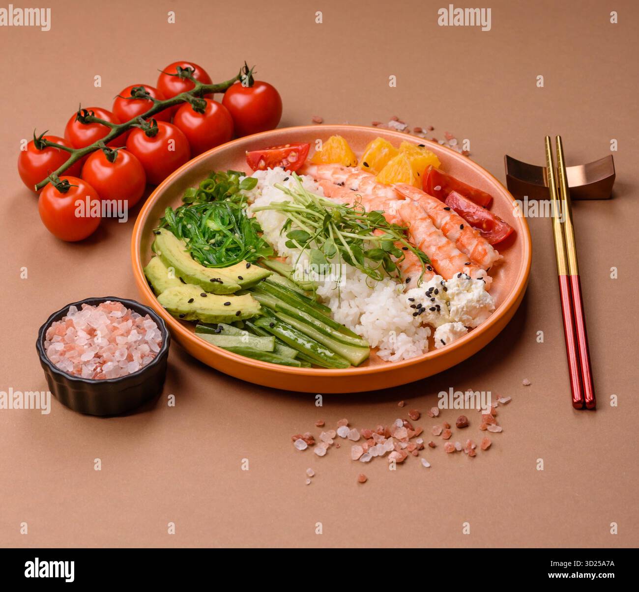 A prawn or shrimp bowl with rice, tomatoes, sauce, and vegetables ...