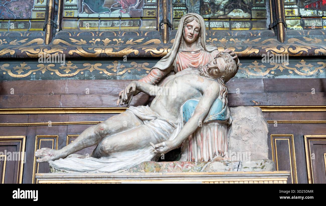 Close-up on statues of Virgin Mary holding the dead body of Jesus ...