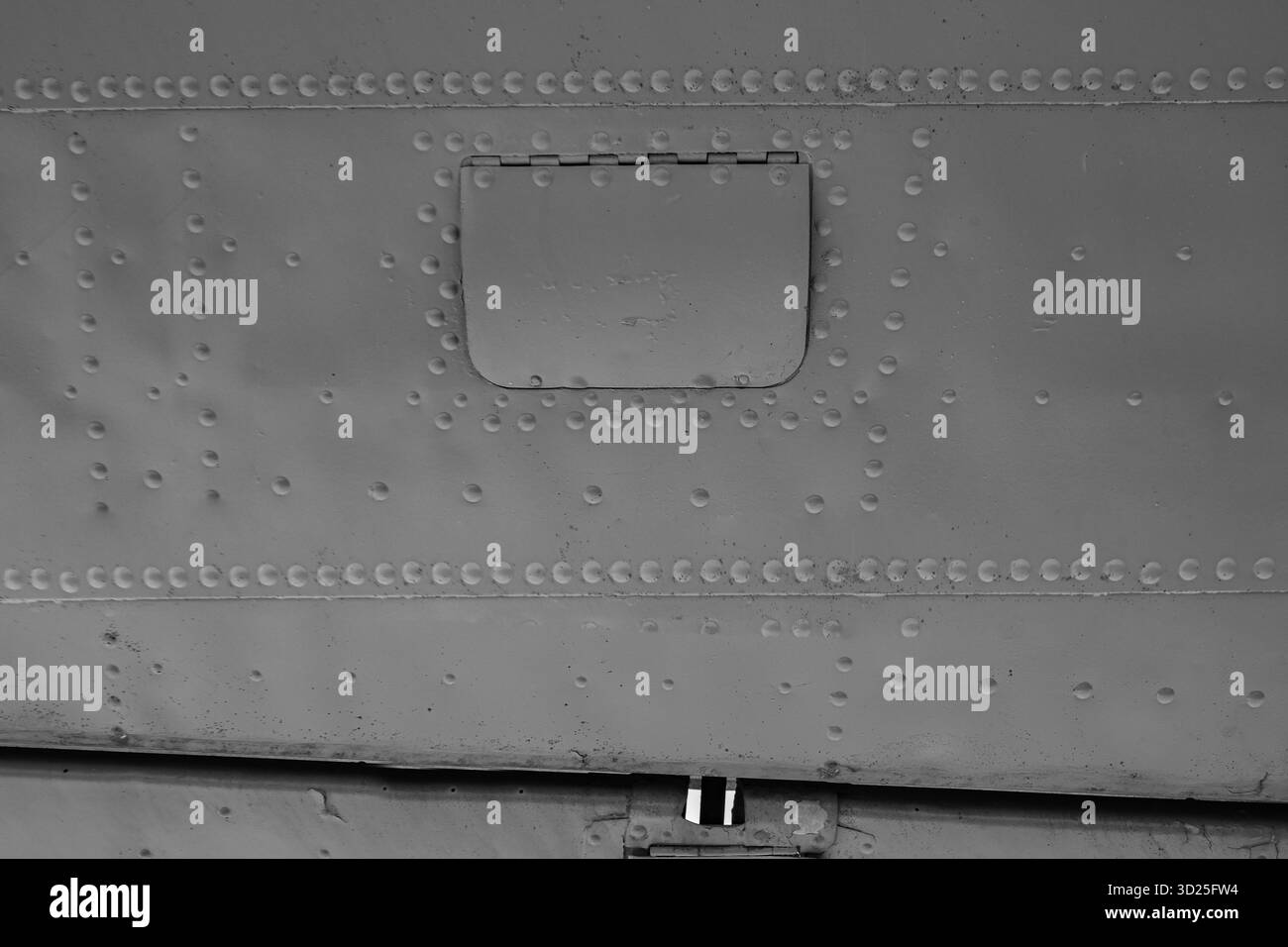 metal panel with rivets creates a vintage and industrial texture ...