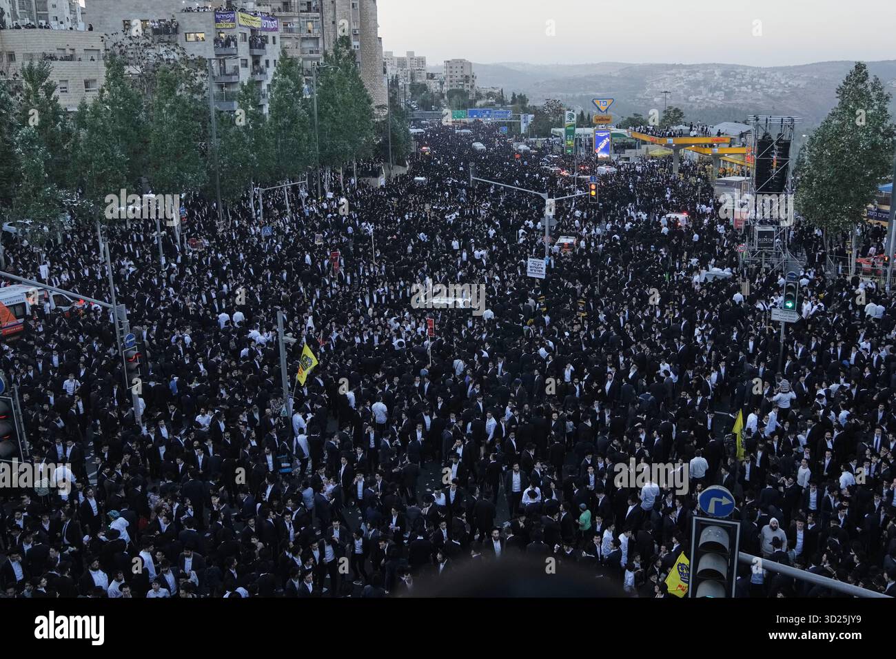 Ultra-Orthodox Jewish men attend a rally against plans to force them to ...