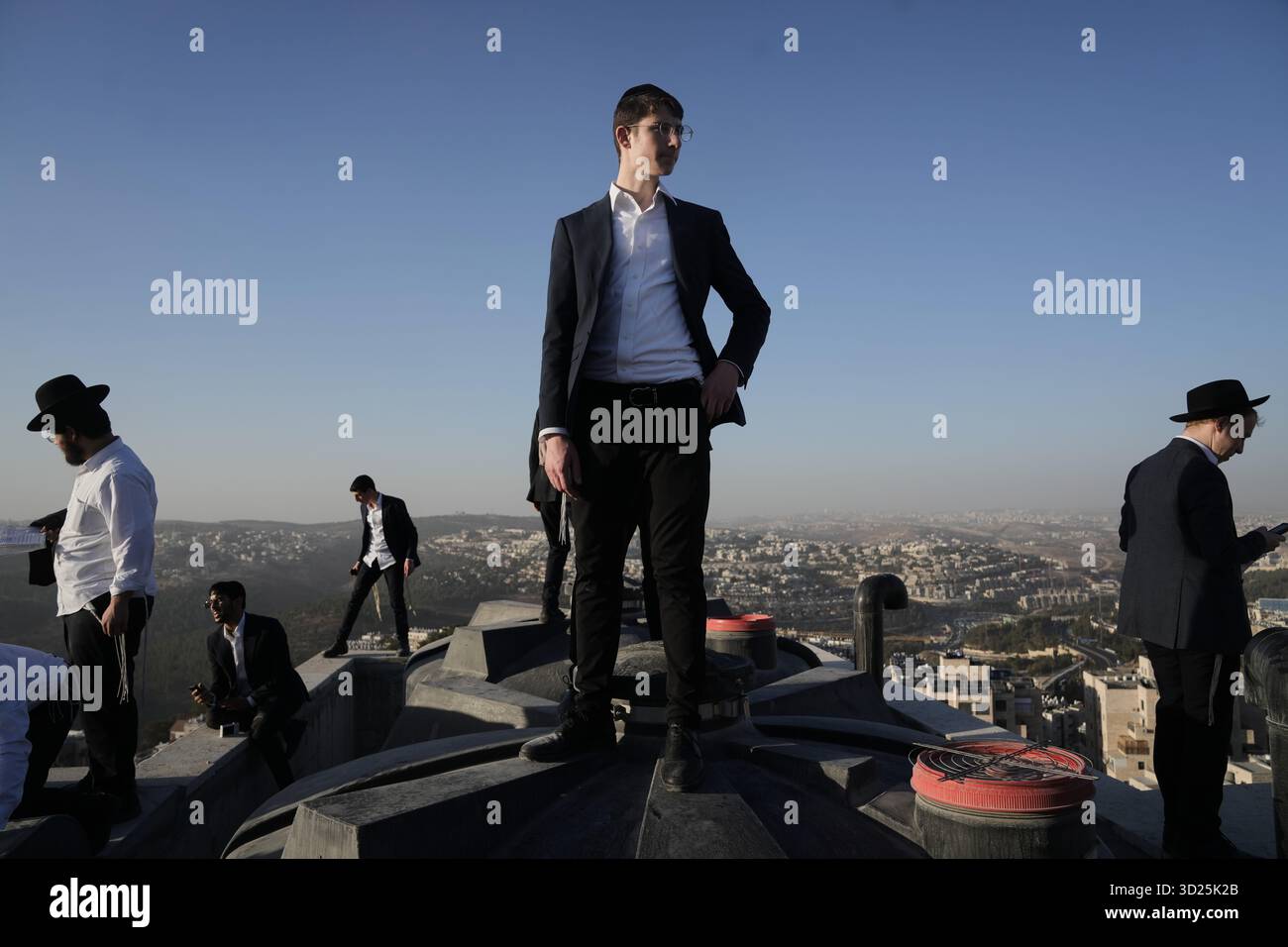Ultra-Orthodox Jewish men attend a rally against plans to force them to ...