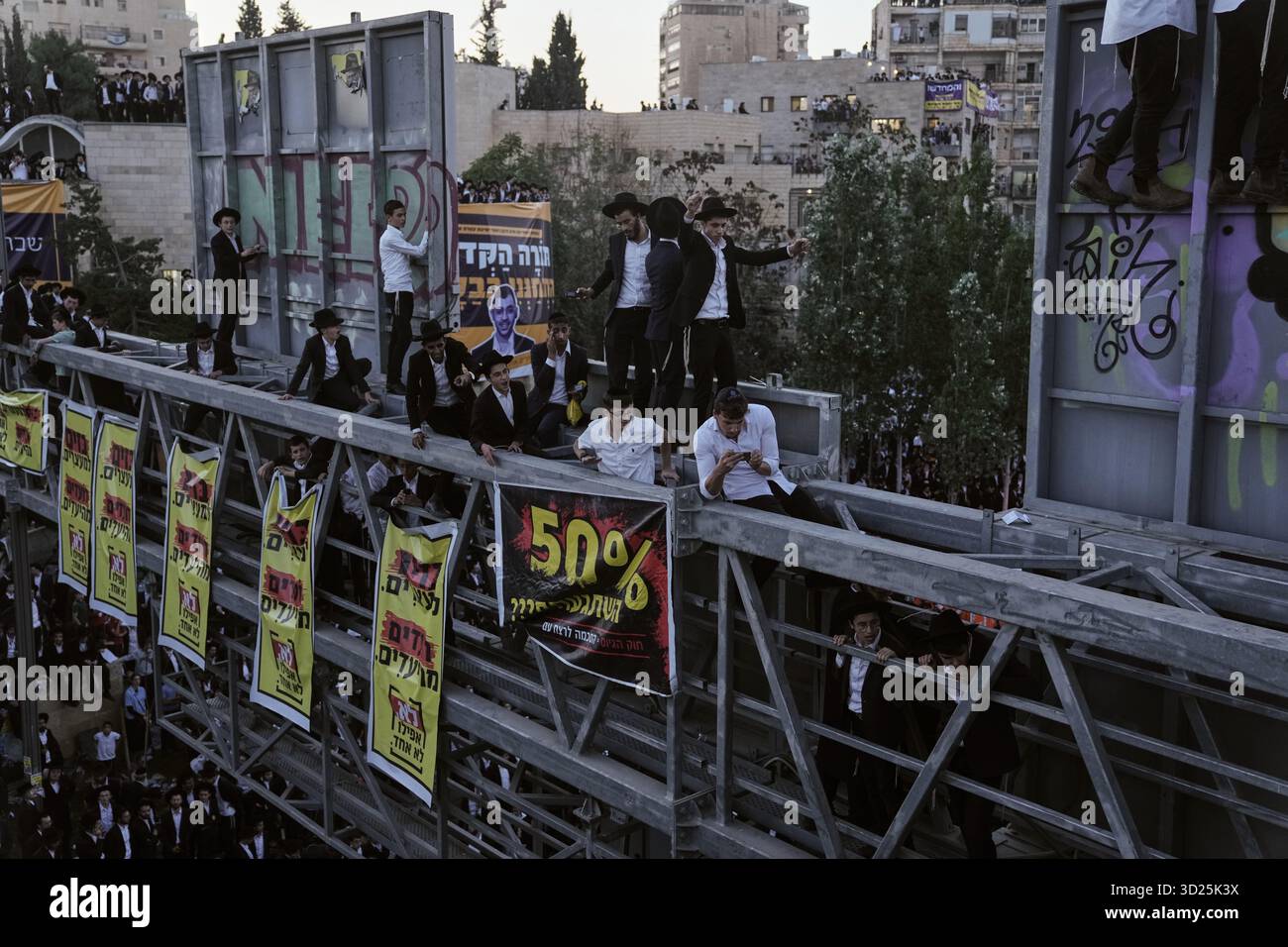Ultra-Orthodox Jewish men attend a rally against plans to force them to ...