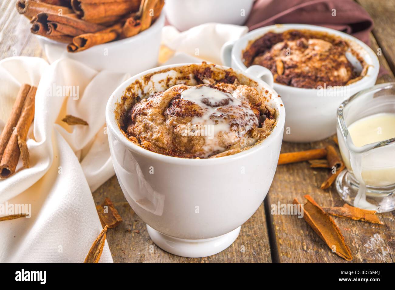 Cinnabon cake in mug. Fast simple microwave dessert idea, background ...