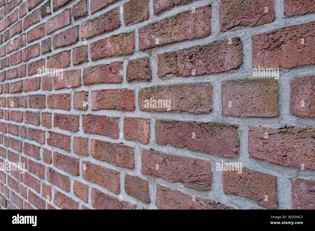 Exterior red brick wall perspective view Stock Photo - Alamy