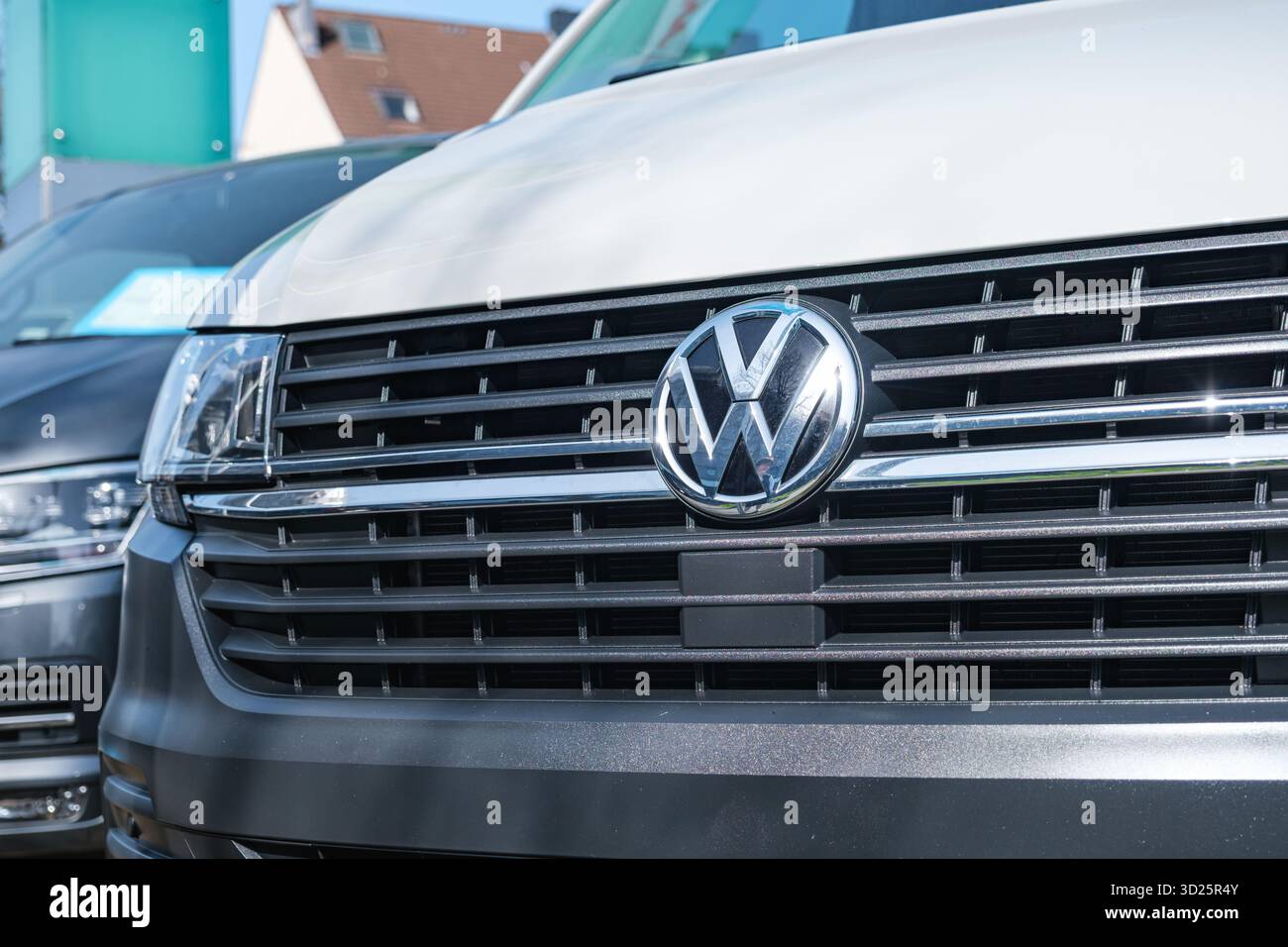 Volkswagen logo on the front grill of a Transporter van Stock Photo - Alamy