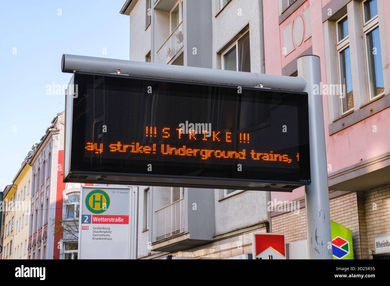 Electronic timetable displaying "STRIKE" at a public transport station ...