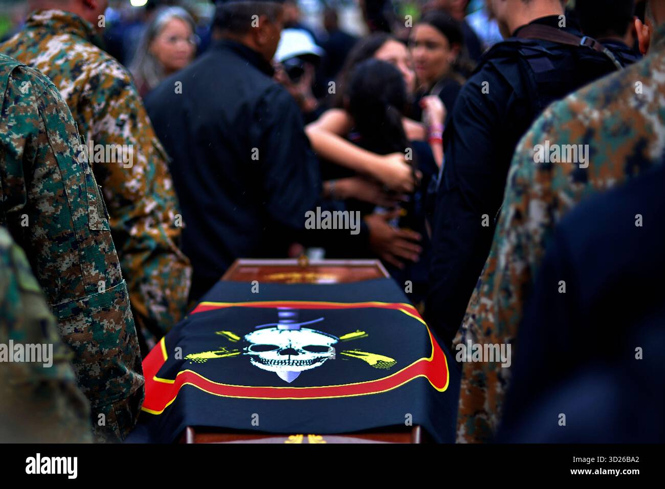 Family and colleagues attend the funeral for a police officer killed ...