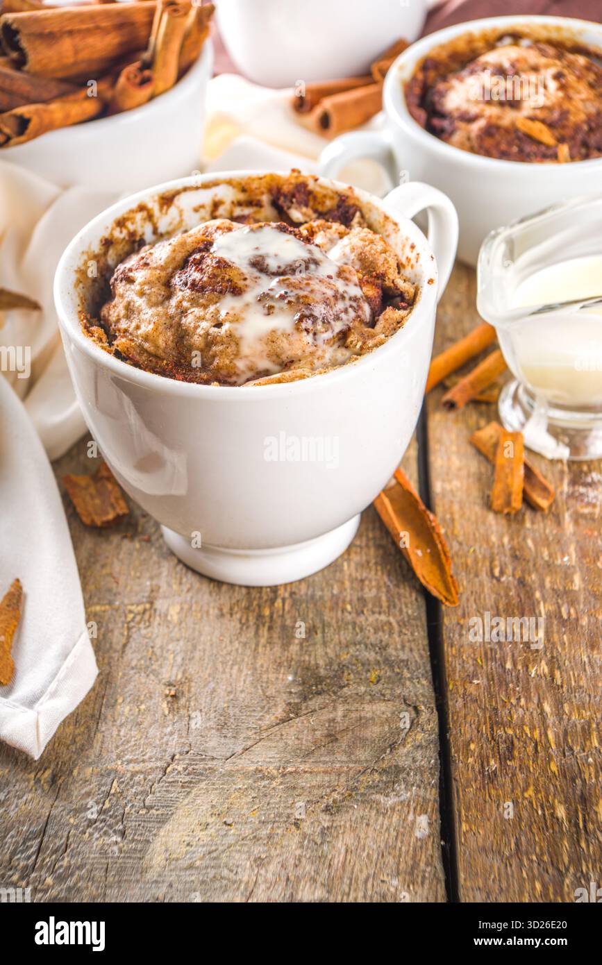 Cinnabon cake in mug. Fast simple microwave dessert idea, background ...