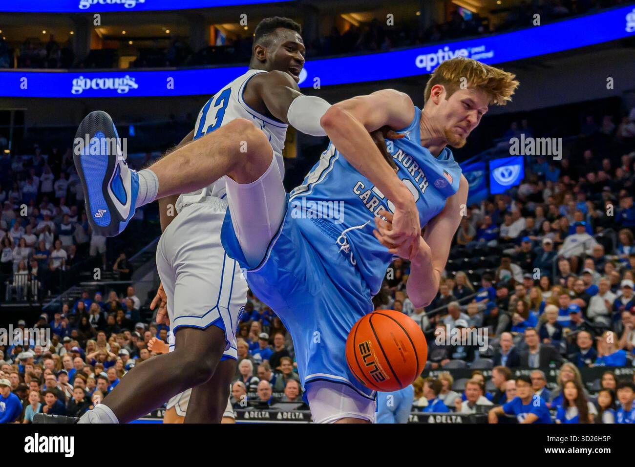 BYU center Keba Keita (13) and North Carolina center Henri Veesaar ...