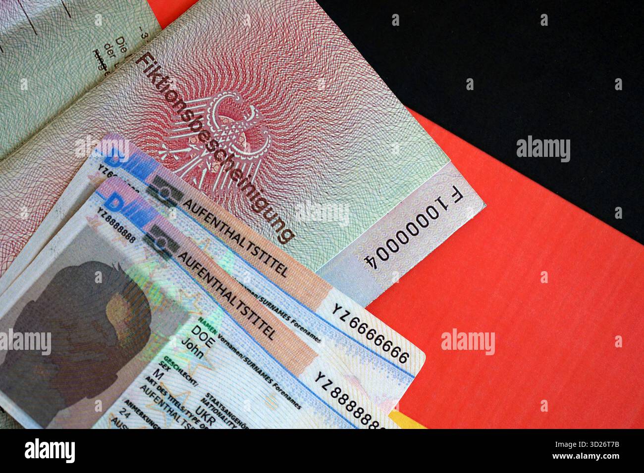 German Permanent resident card and temporary document lies on Germany ...