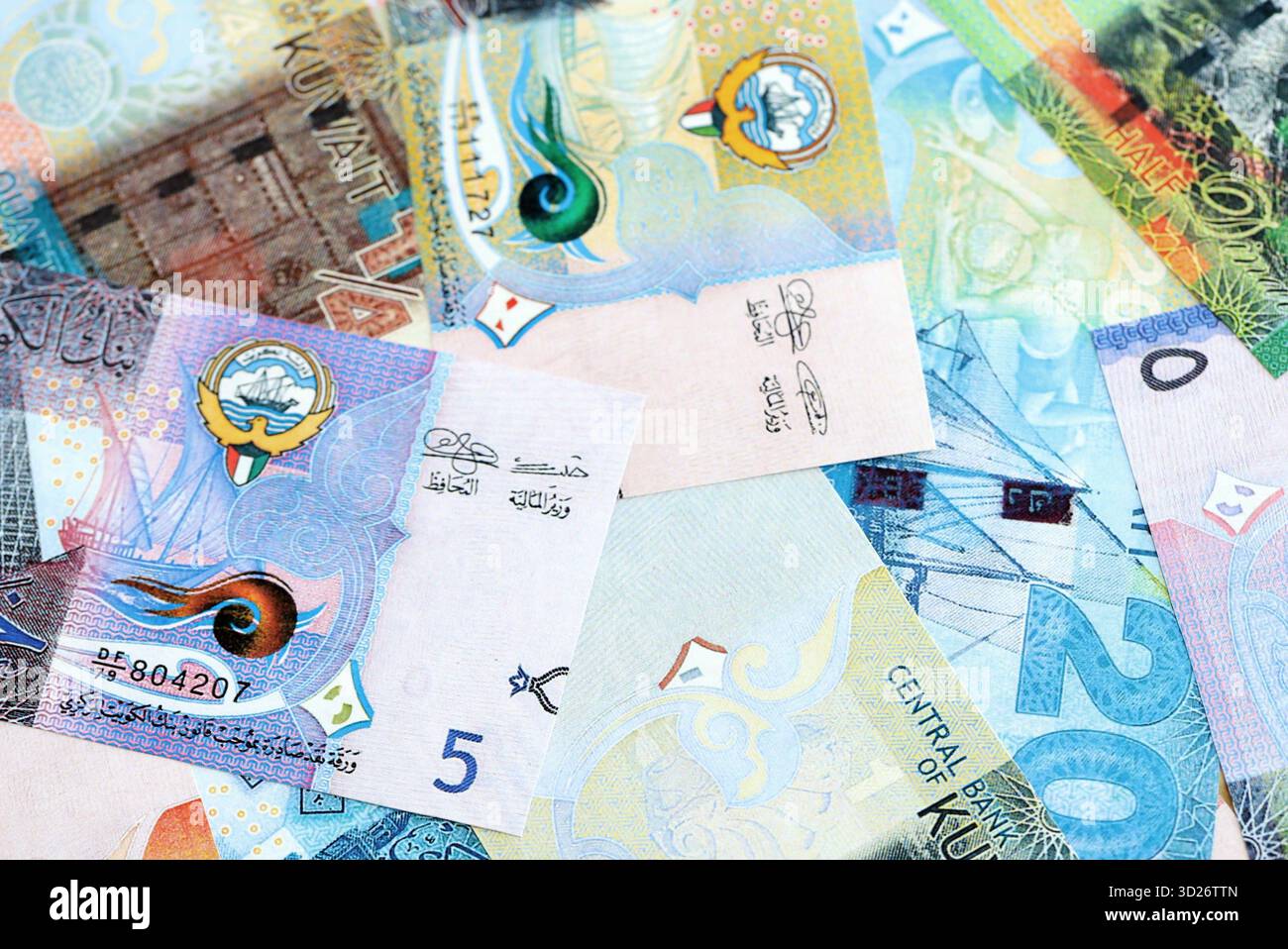 Kuwaiti dinar currency money bills. The current banknotes lies on table ...