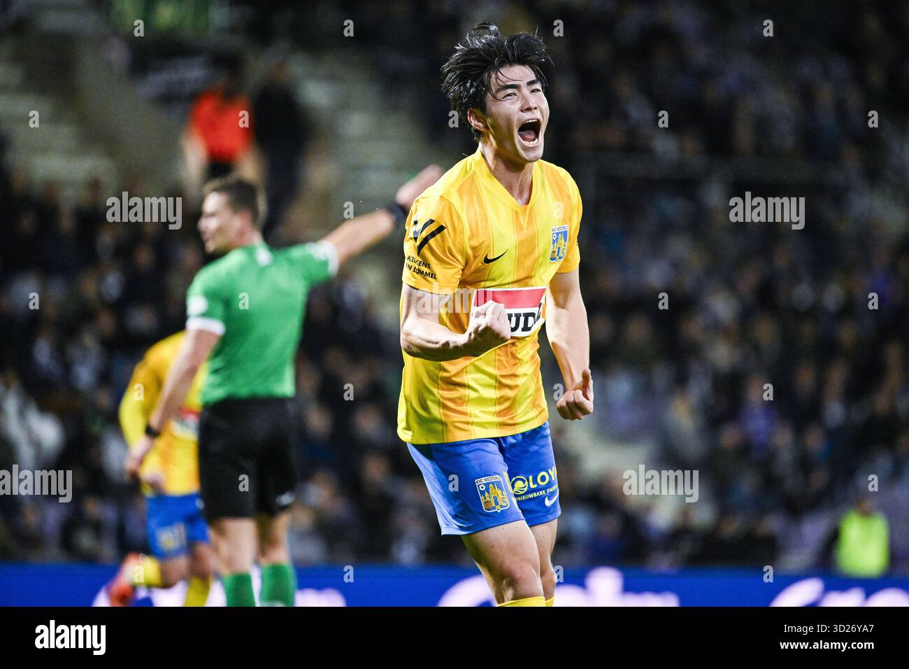 Westerlo's Seji Kimura celebrates after scoring during a soccer game ...