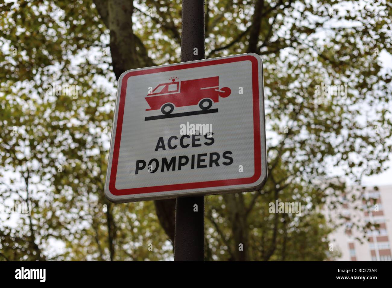 Access for firefighters road sign in French Access Pompiers Stock Photo ...