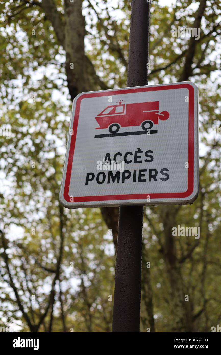 Access for firefighters road sign in French Access Pompiers vertical ...