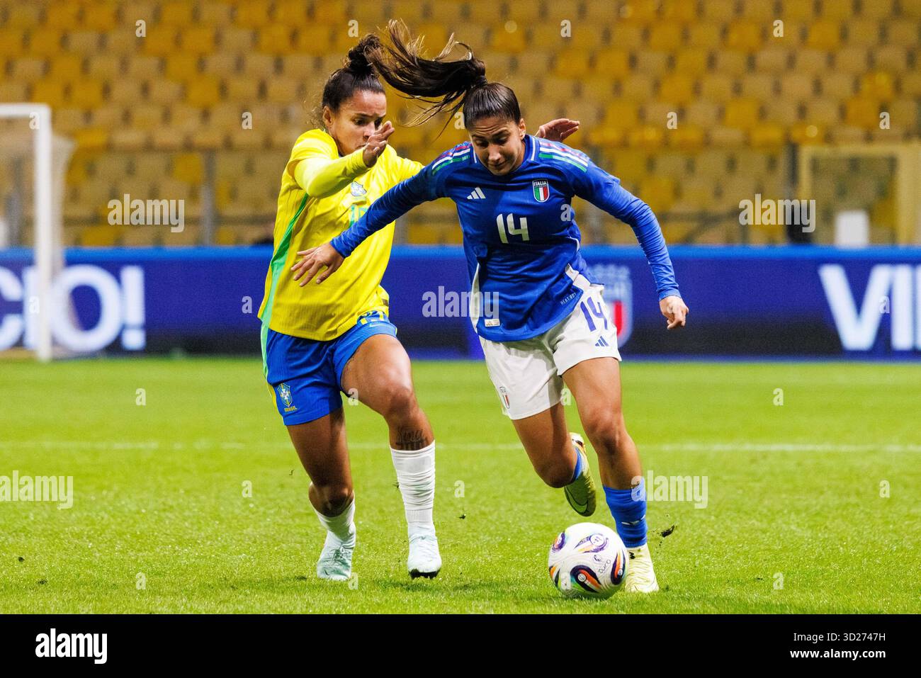 Chiara Beccari of Italy compete for the ball with Isabela Ferreira ...