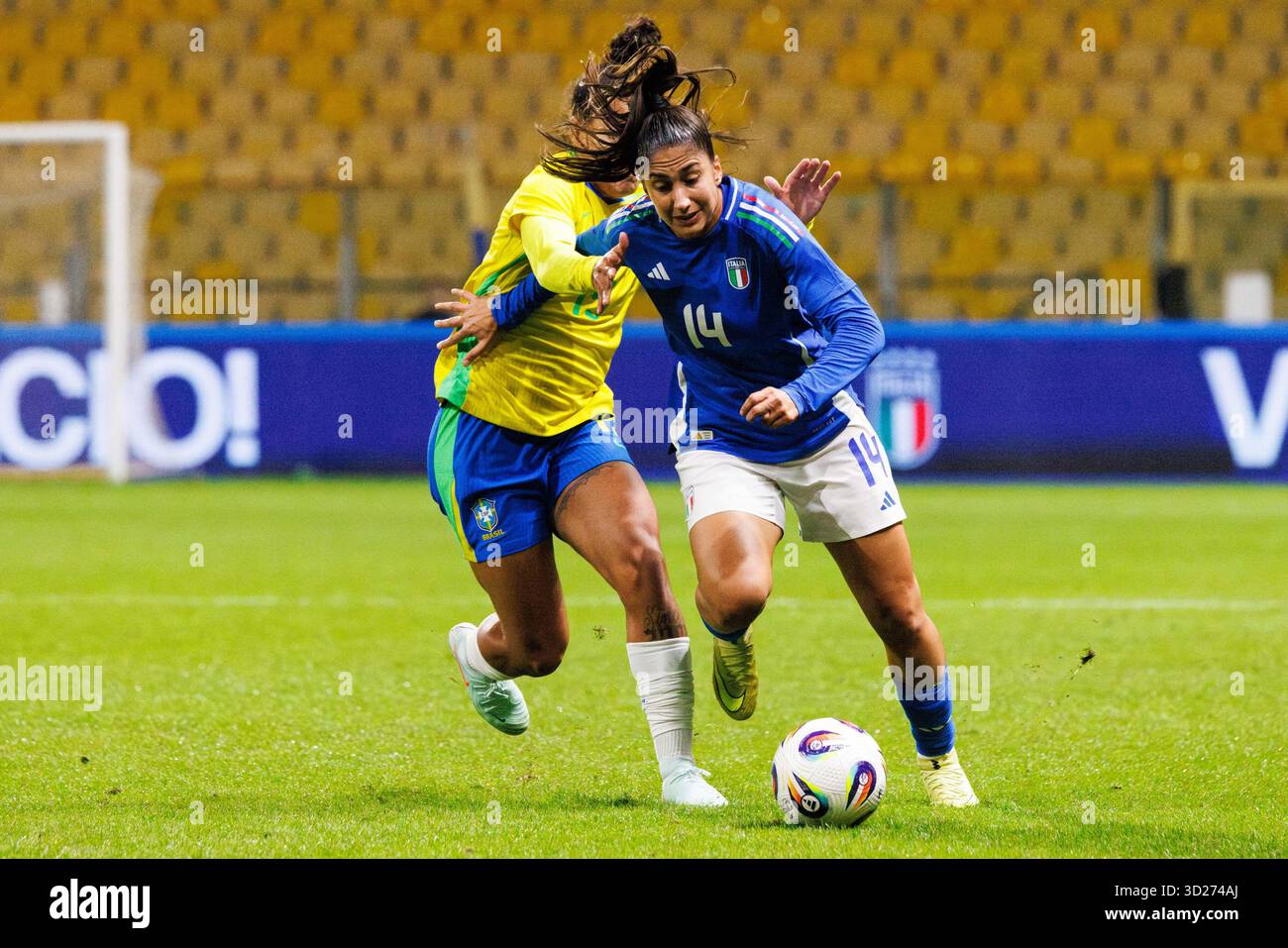 Chiara Beccari of Italy compete for the ball with Isabela Ferreira ...