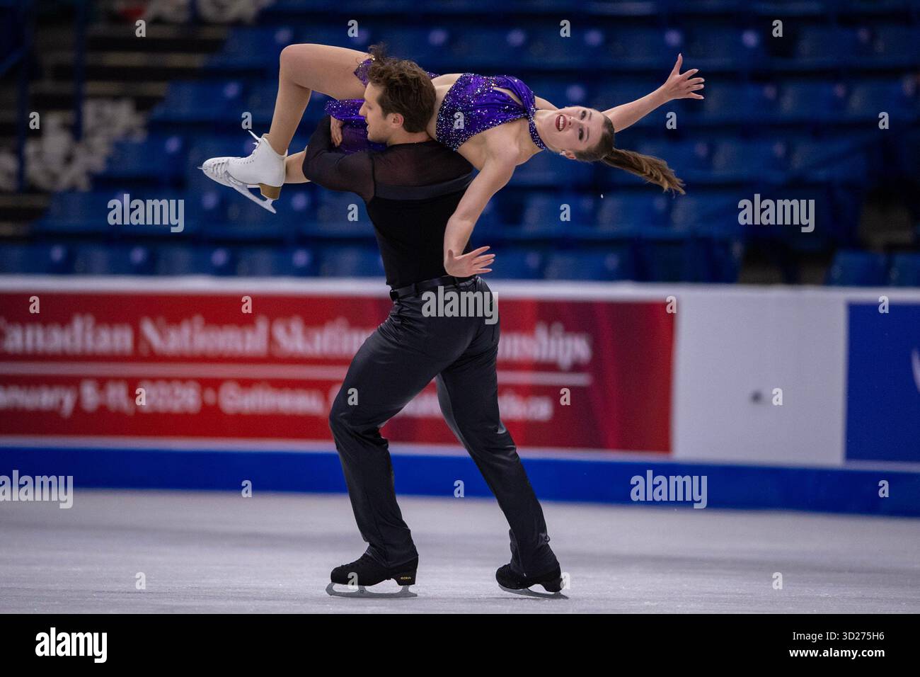 United States' Christina Carreira and Anthony Ponomarenko skate during ...