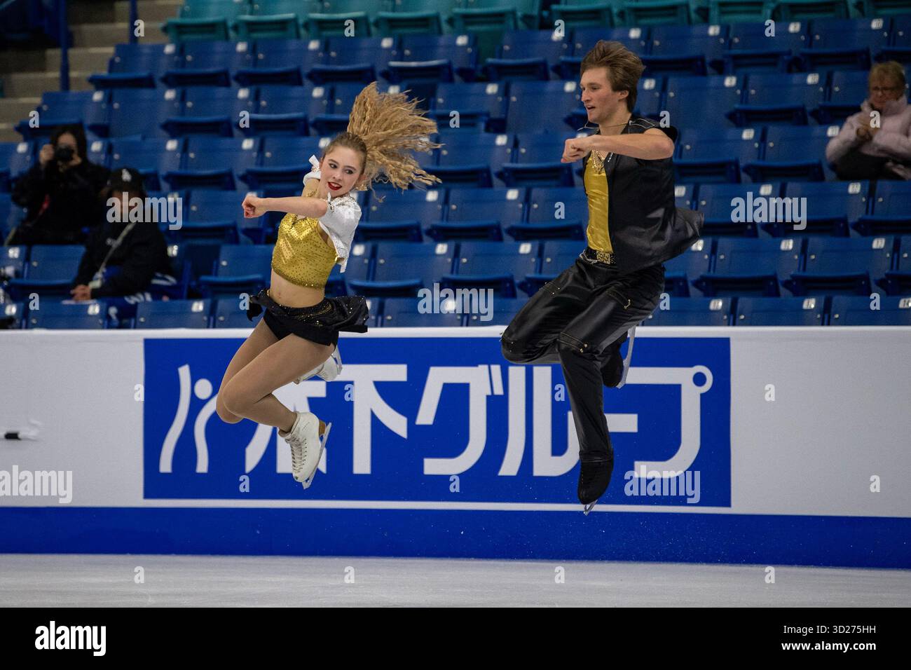 United States' Leah Neset and Artem Markelov skate during practice for ...