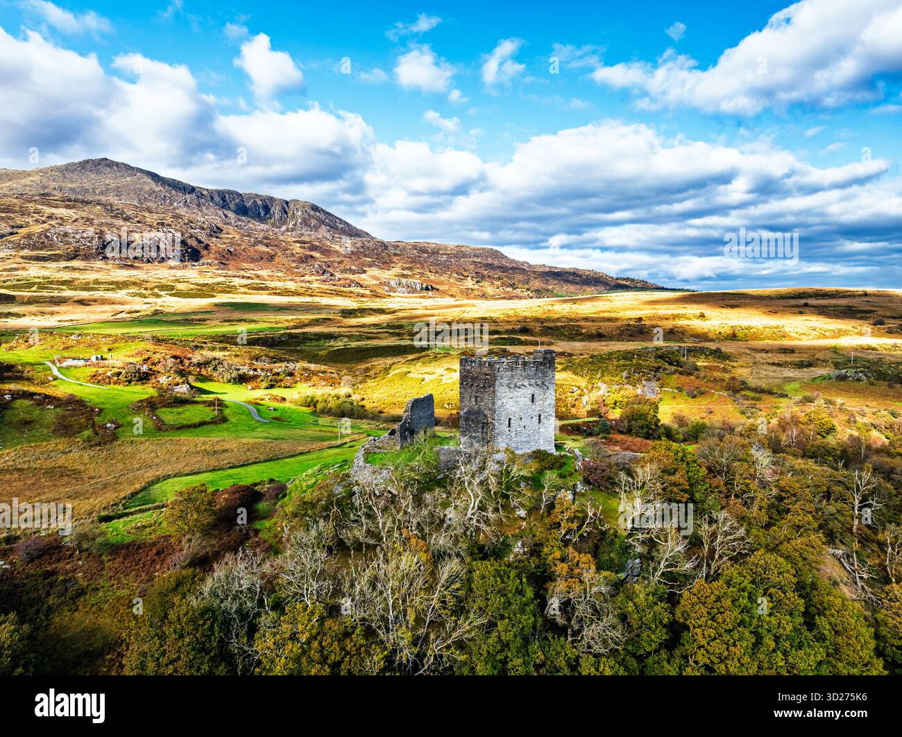 Autumn colours over Castell Dolwyddelan and Eryri Mountains from a ...