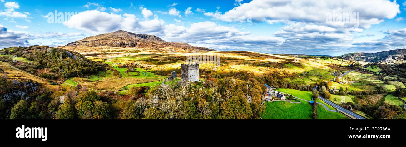 Autumn colours over Castell Dolwyddelan and Eryri Mountains from a ...