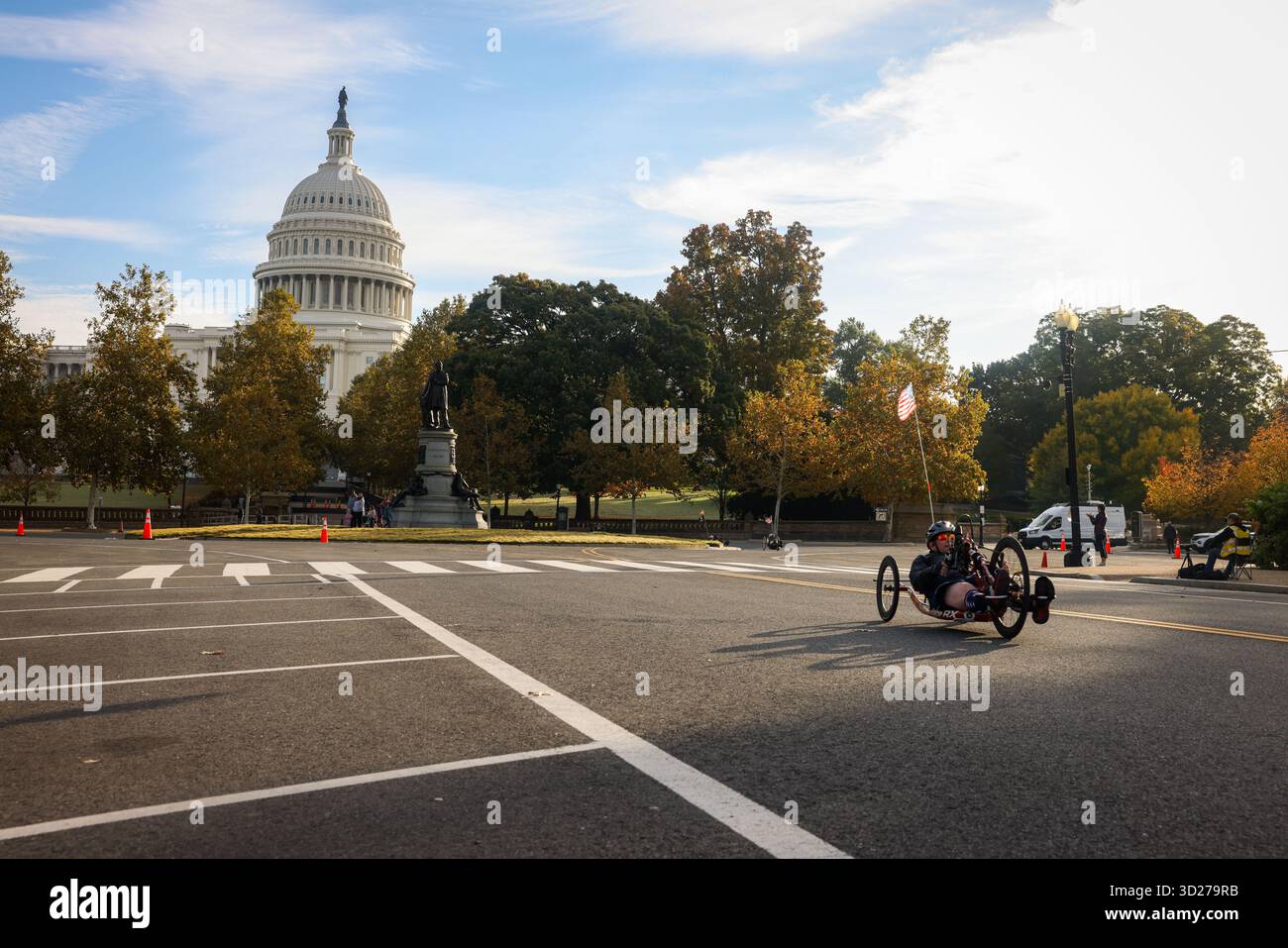 A participant of the 50th Marine Corps Marathon races through the ...