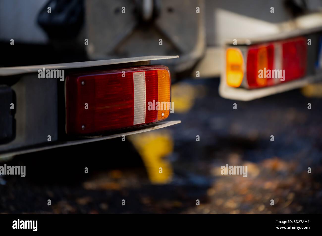 Rear truck lights with red and yellow lenses representing safety ...