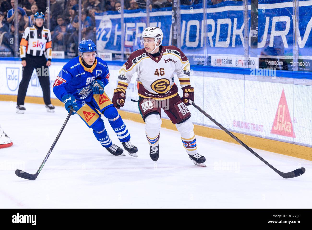Colin Lindemann #95 (EV Zug) and Vili Saarijarvi #46 (Geneve-Servette ...